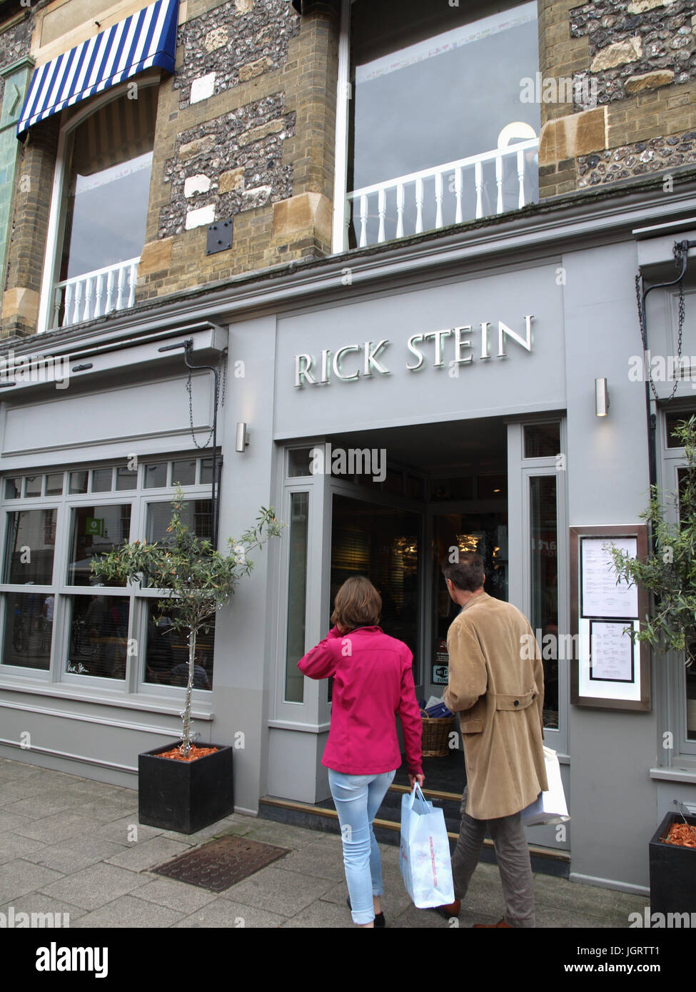 Well dressed, good looking couple visting celebrity chef, Rick Stein ...