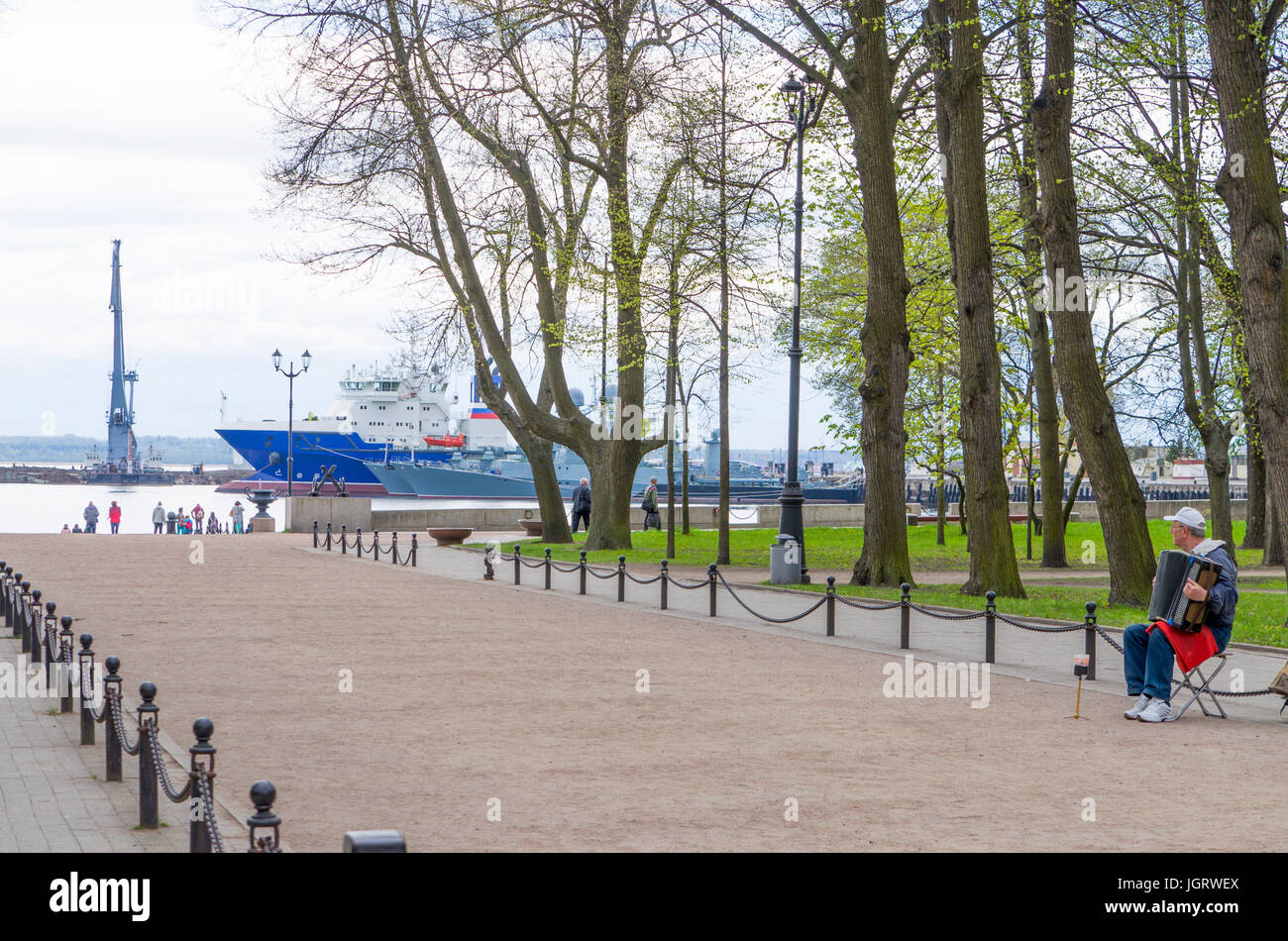 Pier with the beacon in Kronstadt Russia Stock Photo - Alamy