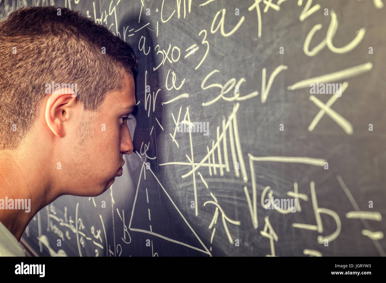 Boy thinking math hi-res stock photography and images - Alamy