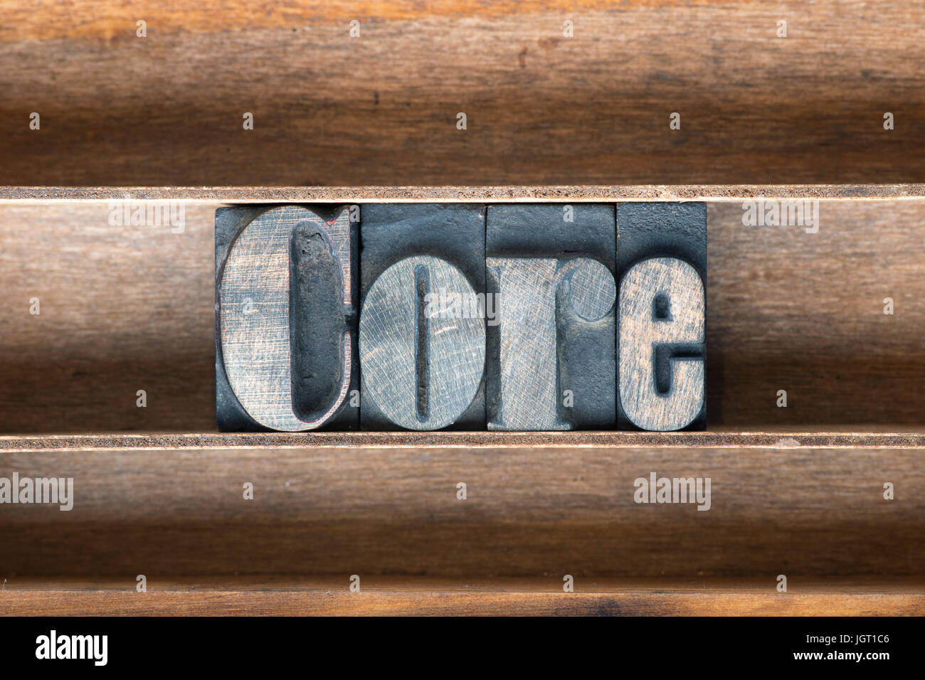 core word made from vintage letterpress type on wooden tray Stock Photo ...