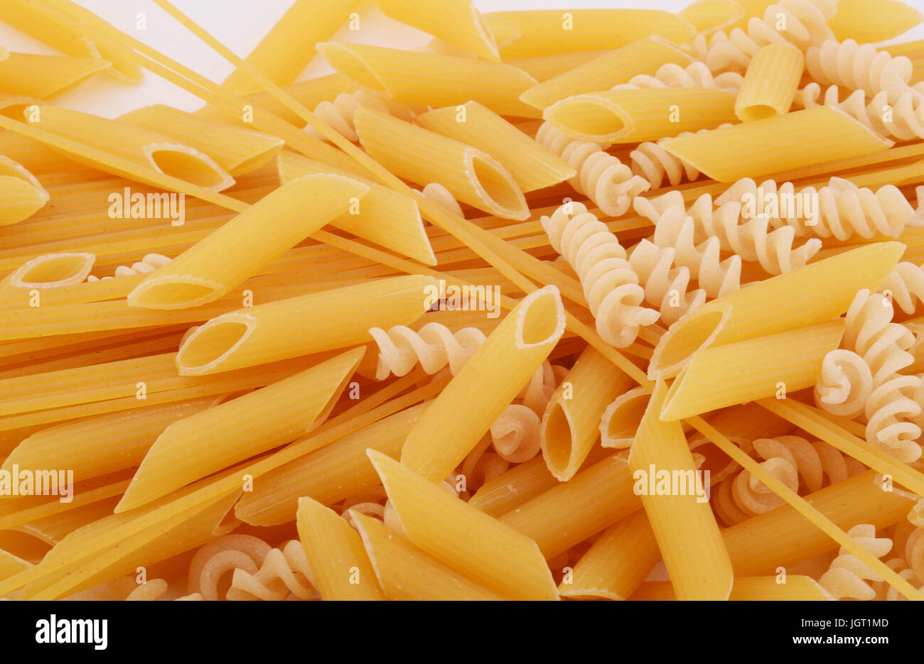 Various types of pasta isolated on white background Stock Photo - Alamy