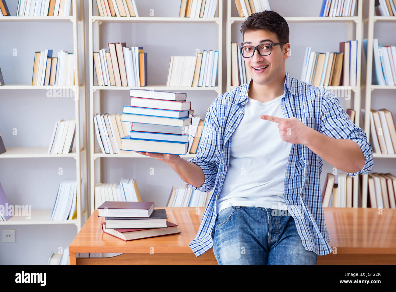 Young student with books preparing for exams Stock Photo - Alamy