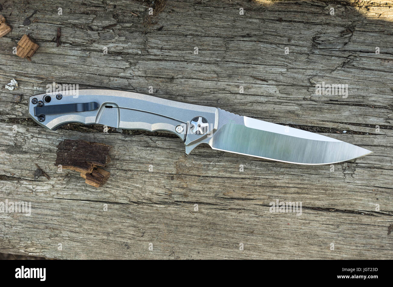 Knife with a titanium handle photographed from top Stock Photo - Alamy