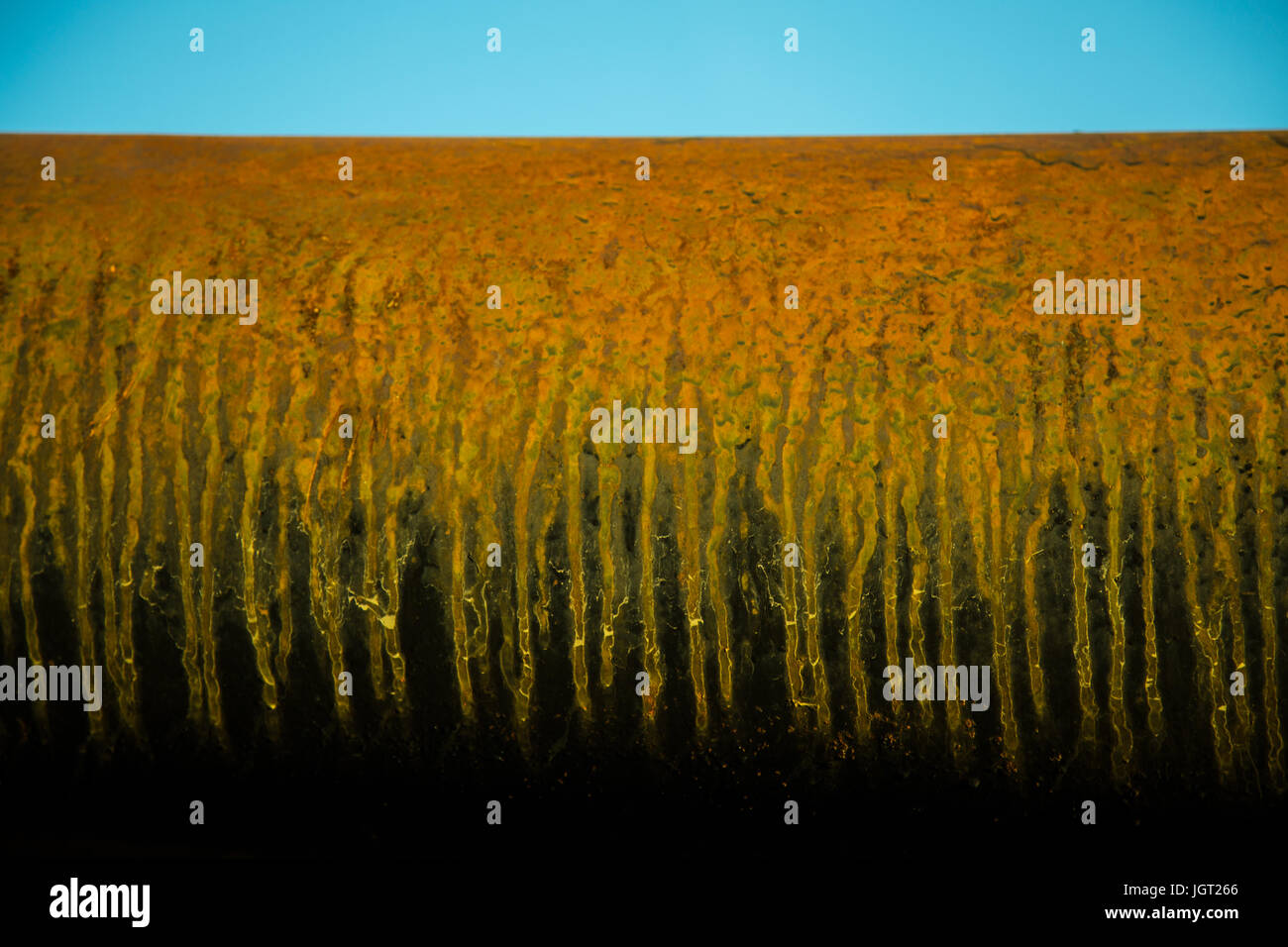 Rusty pipe acid background Stock Photo - Alamy