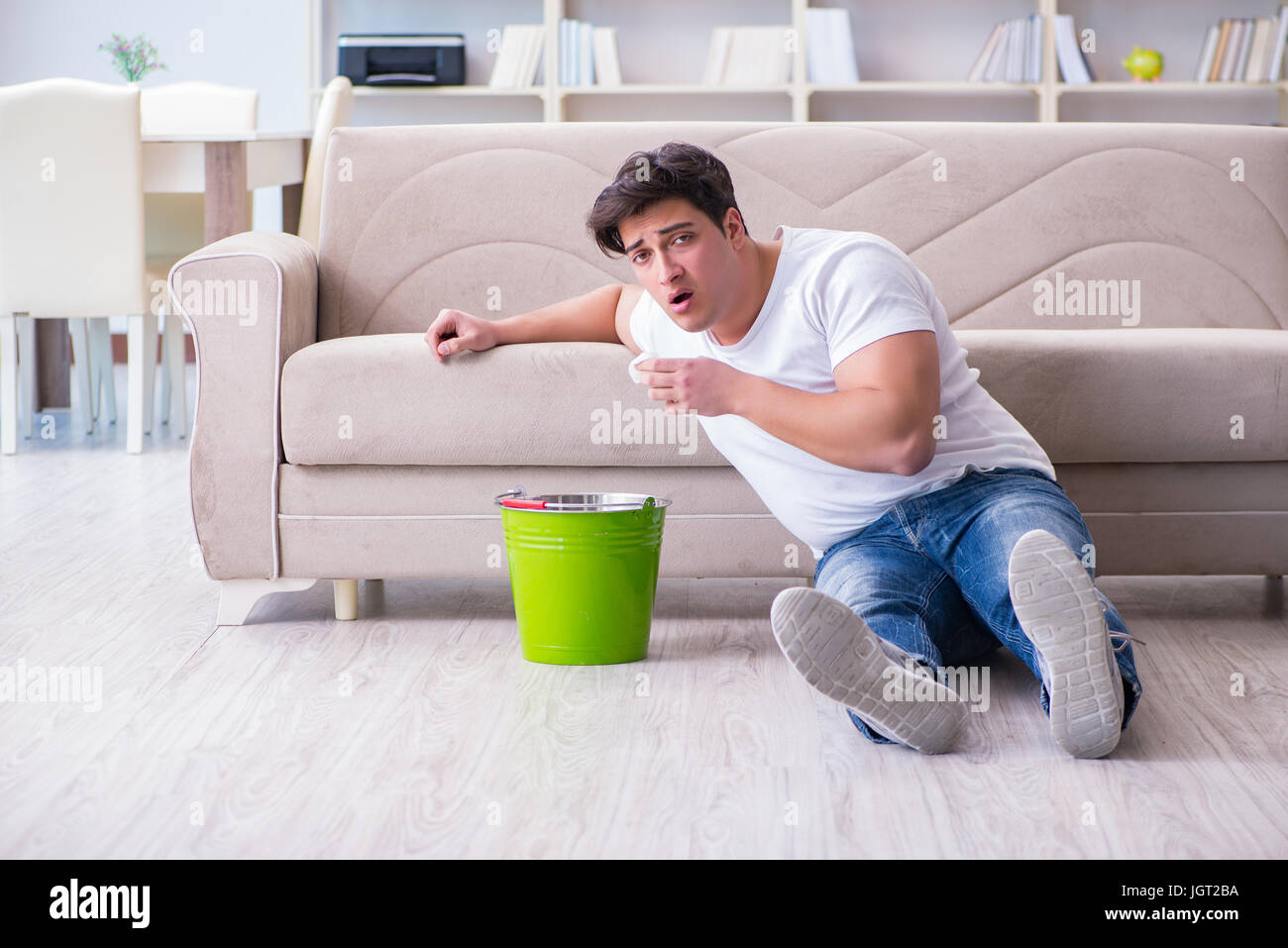 Man suffering from sick stomach and vomiting Stock Photo - Alamy