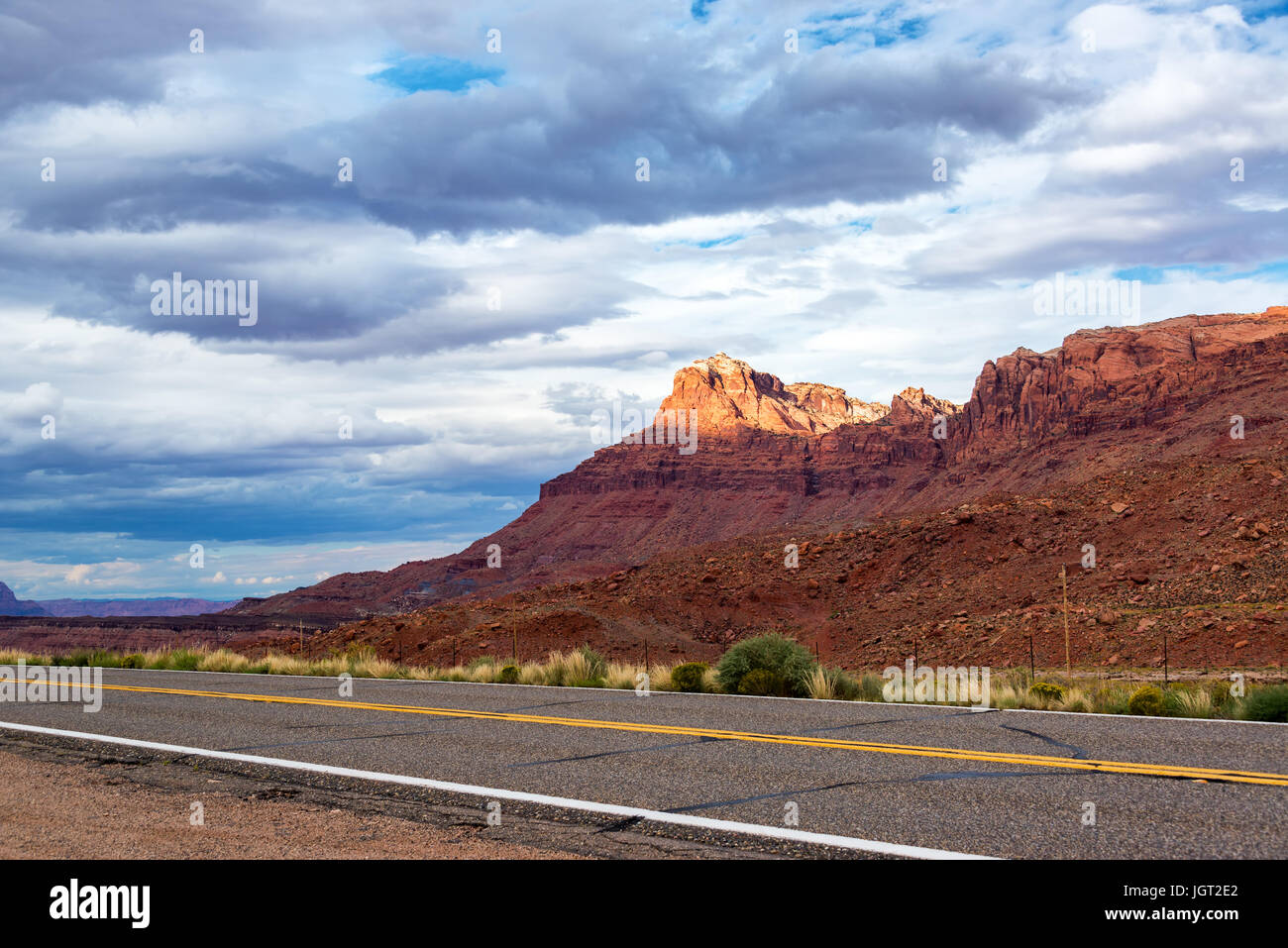 Highway in Arizona passing through a dramatic landscape Stock Photo - Alamy