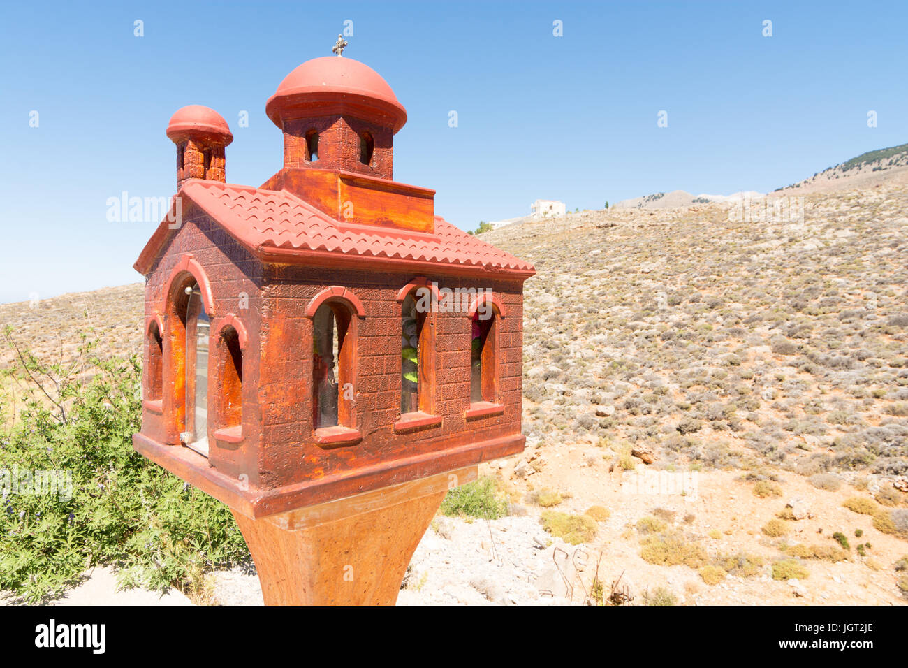 Roadside miniature church memorial shrine on the Greek island of Crete ...