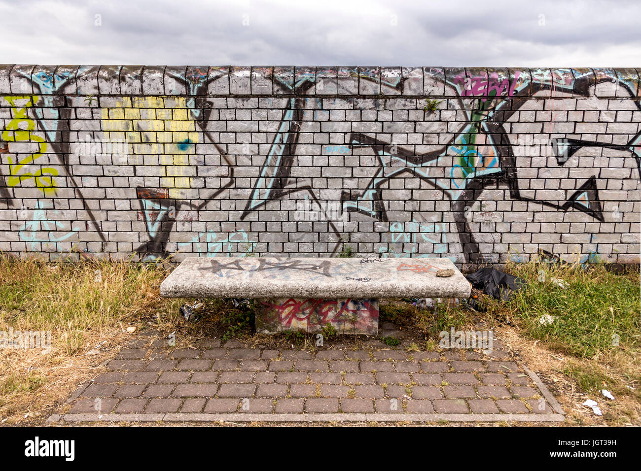 City bench with youth graffiti Stock Photo - Alamy