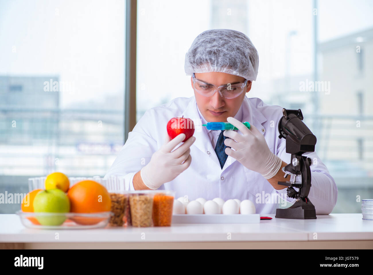Nutrition expert testing food products in lab Stock Photo - Alamy