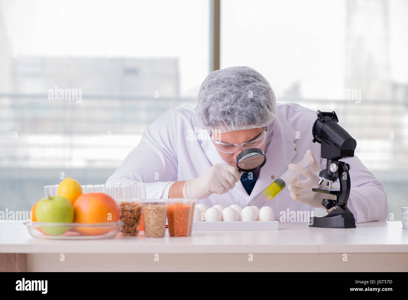 Nutrition expert testing food products in lab Stock Photo - Alamy