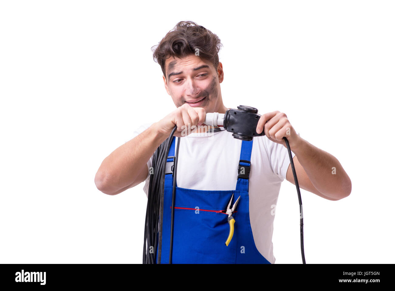 Funny man doing electrical repair Stock Photo - Alamy