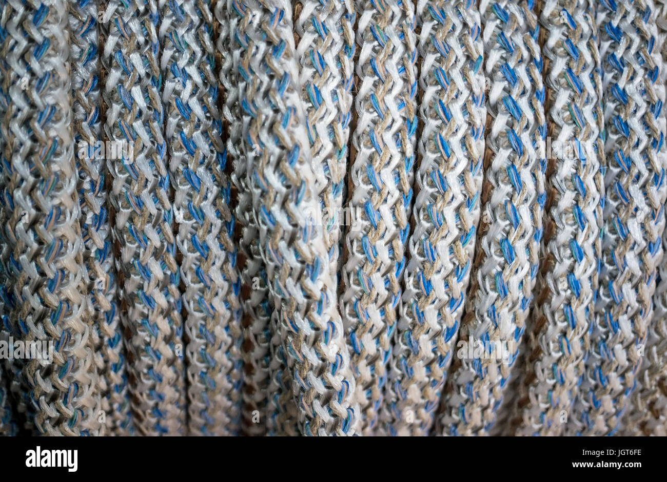 Texture braided rope white and blue colors. Background. The horizontal ...