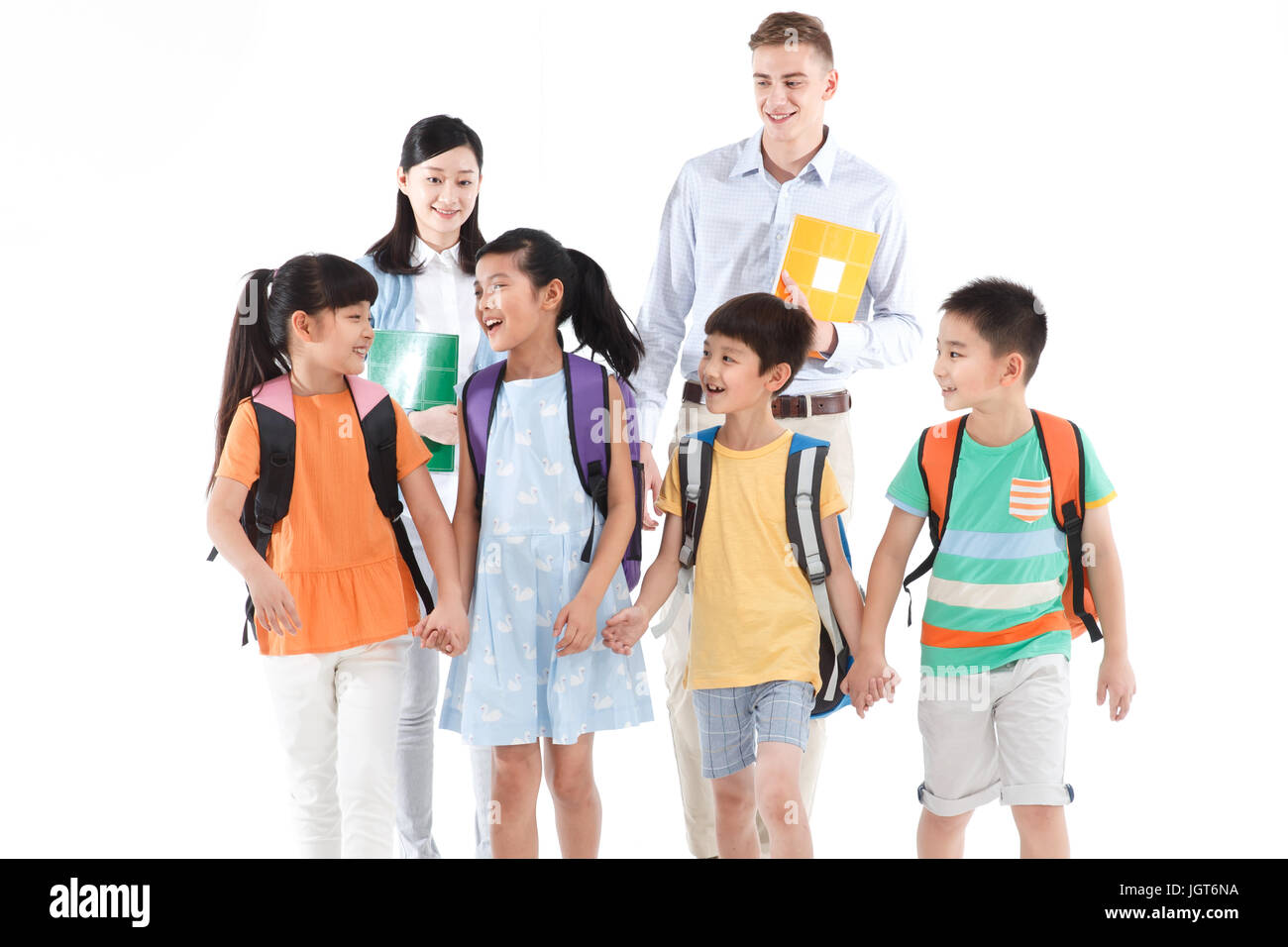 Cheerful students and teachers Stock Photo - Alamy