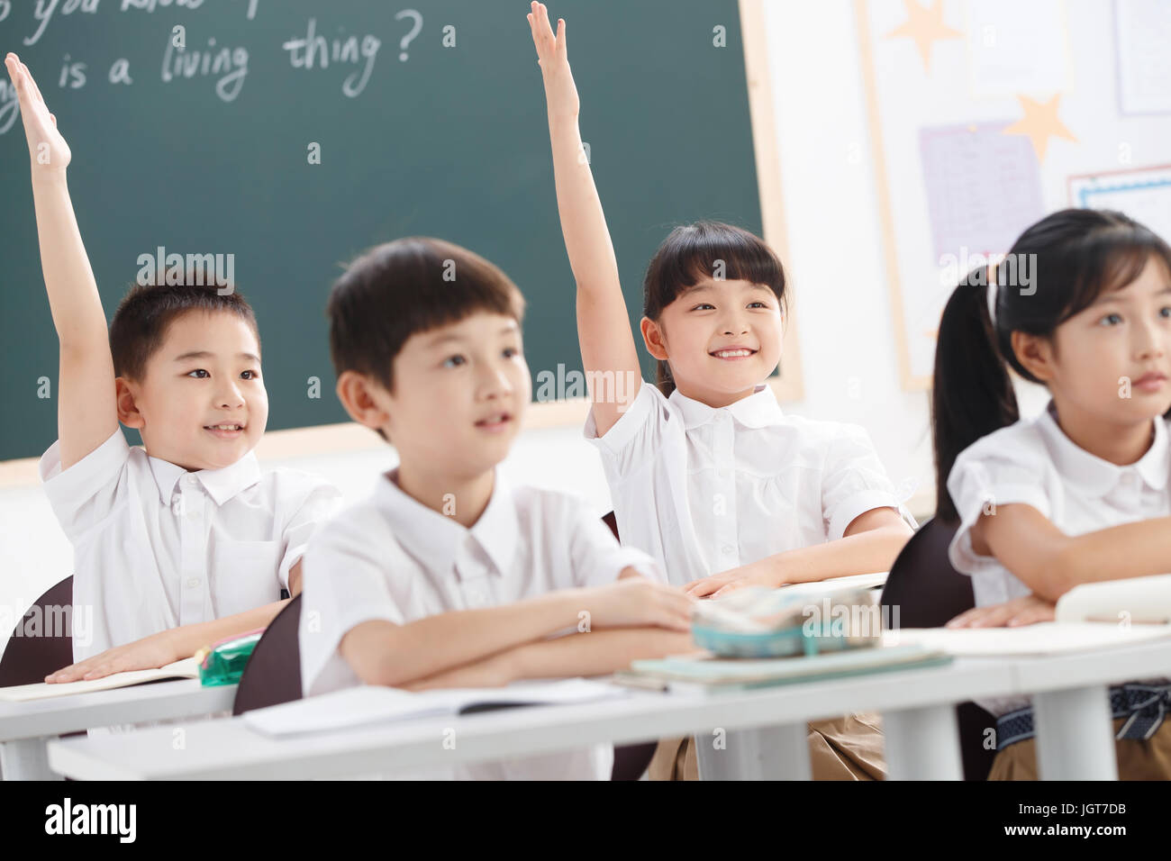 Students studying in classroom Stock Photo - Alamy