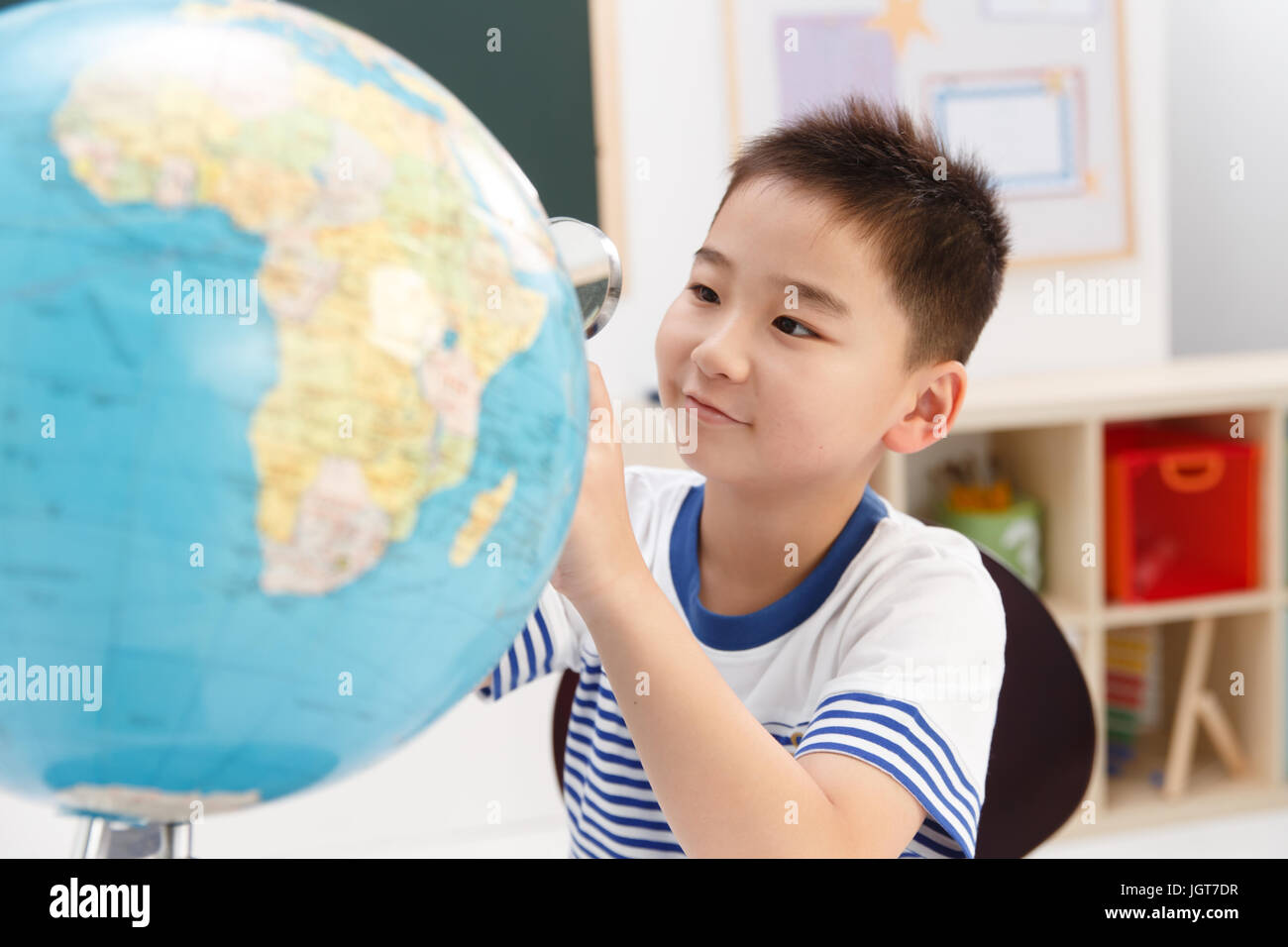 Primary school boys in the classroom Stock Photo - Alamy