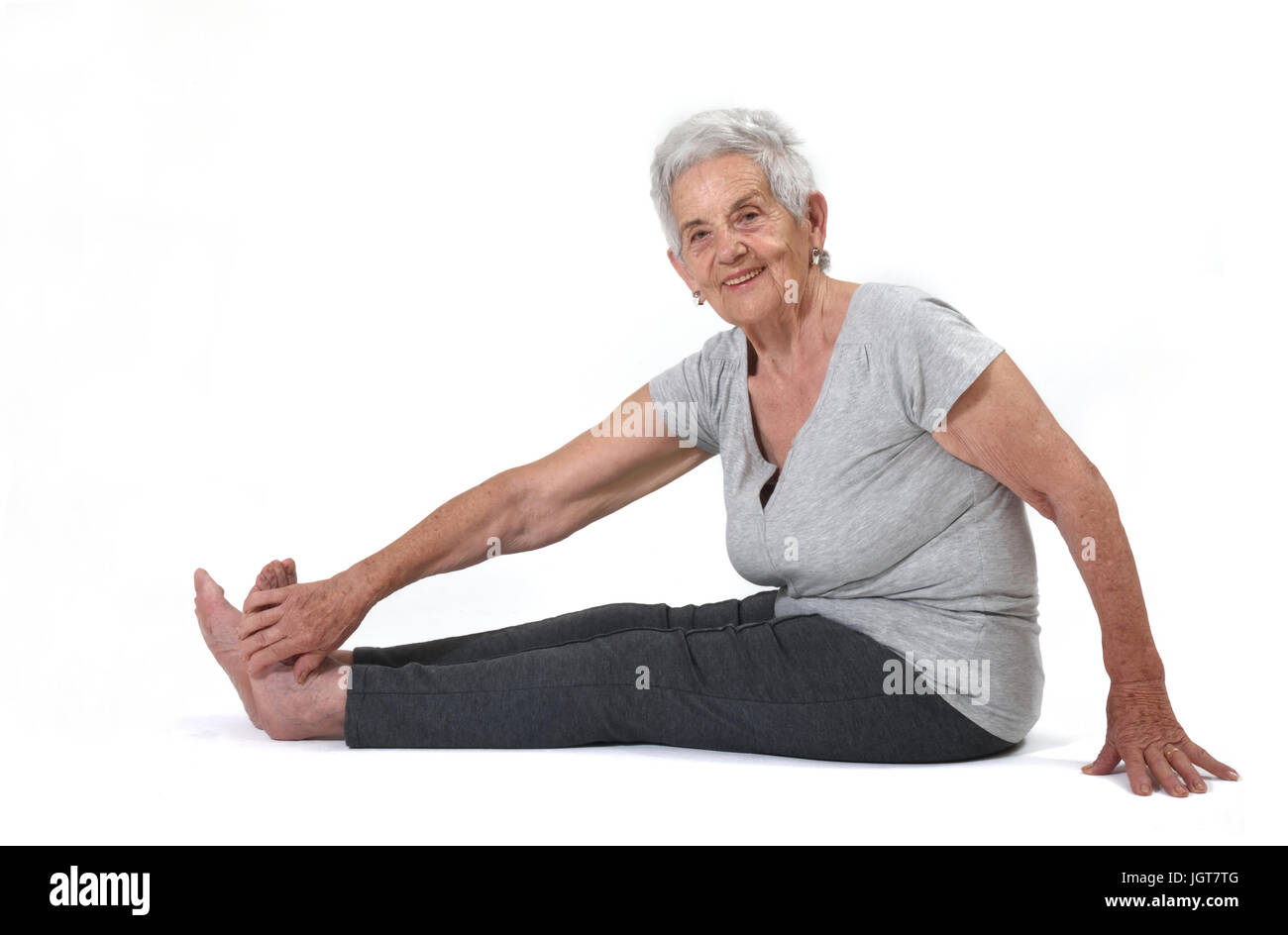 Old woman exercises doing Cut Out Stock Images & Pictures - Alamy
