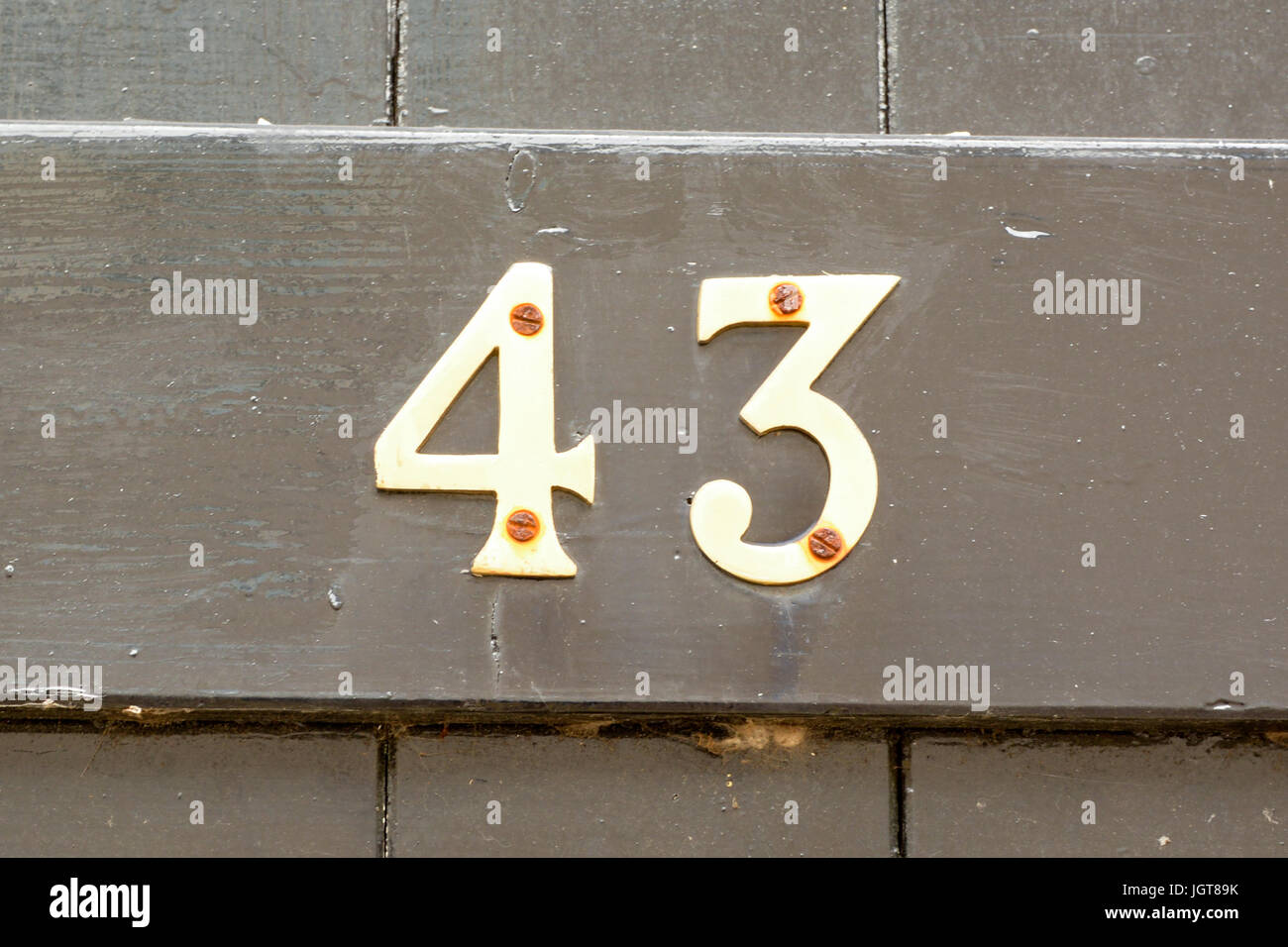 House number 43 sign on gate hi-res stock photography and images - Alamy