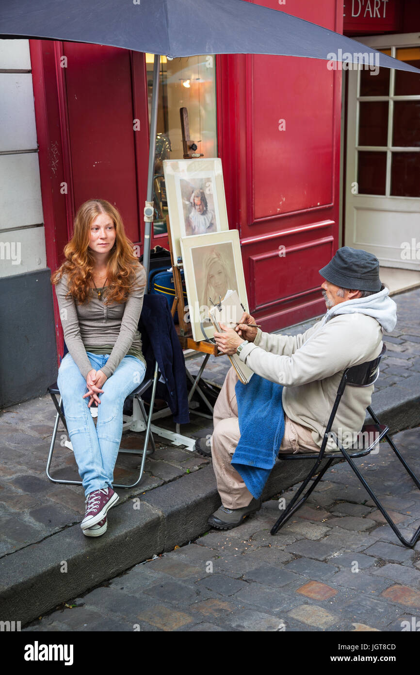 PARIS, FRANCE – JUNE 6, 2012: An unidentified model has her portrait ...