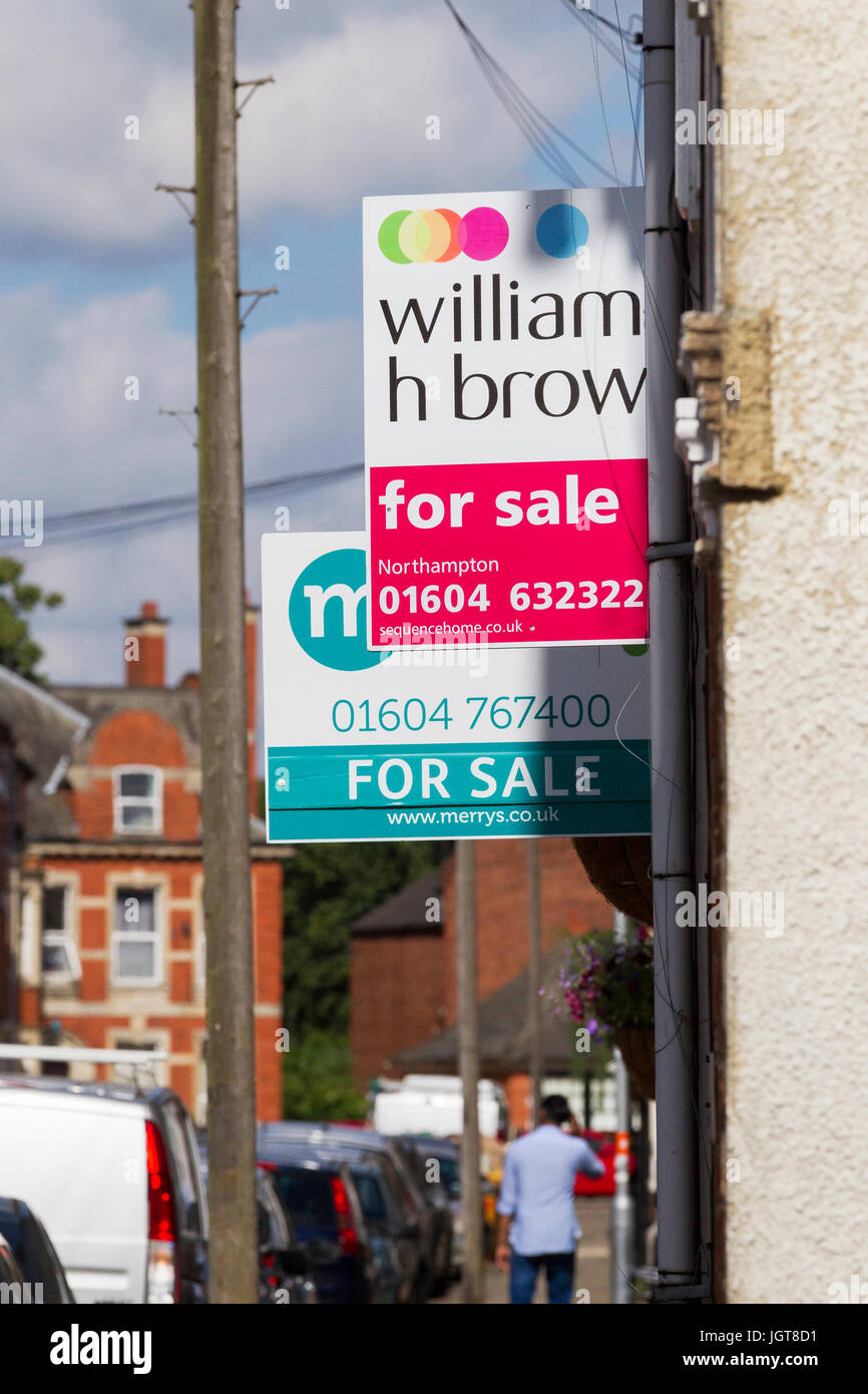 Signs selling and advertising in Northampton Stock Photo - Alamy
