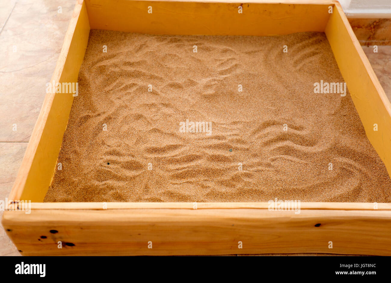 Sandbox made homemade with wood Stock Photo - Alamy