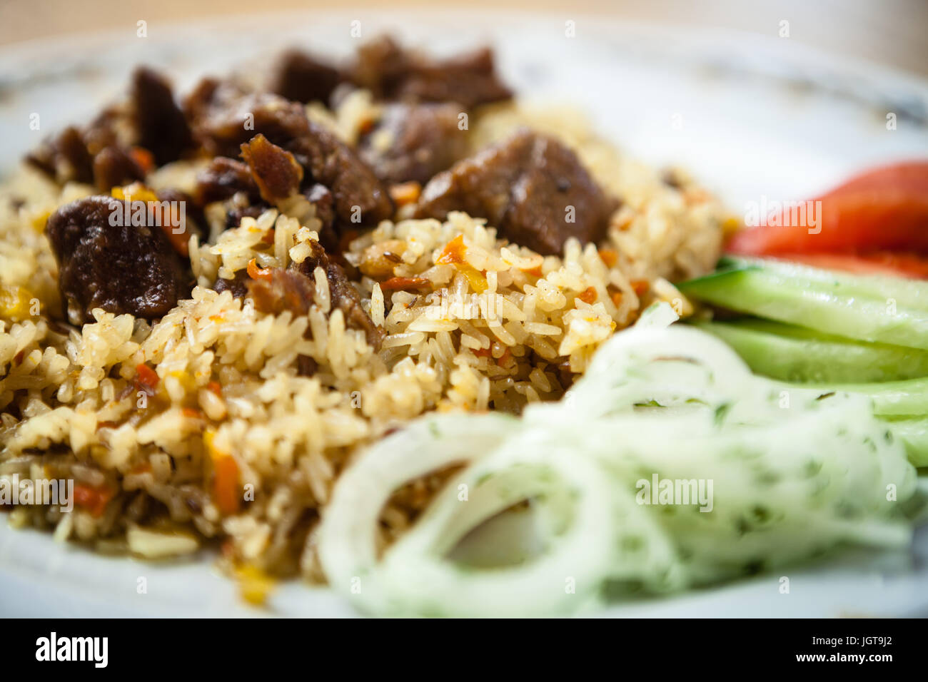 Uzbek pilaf with beef Stock Photo - Alamy