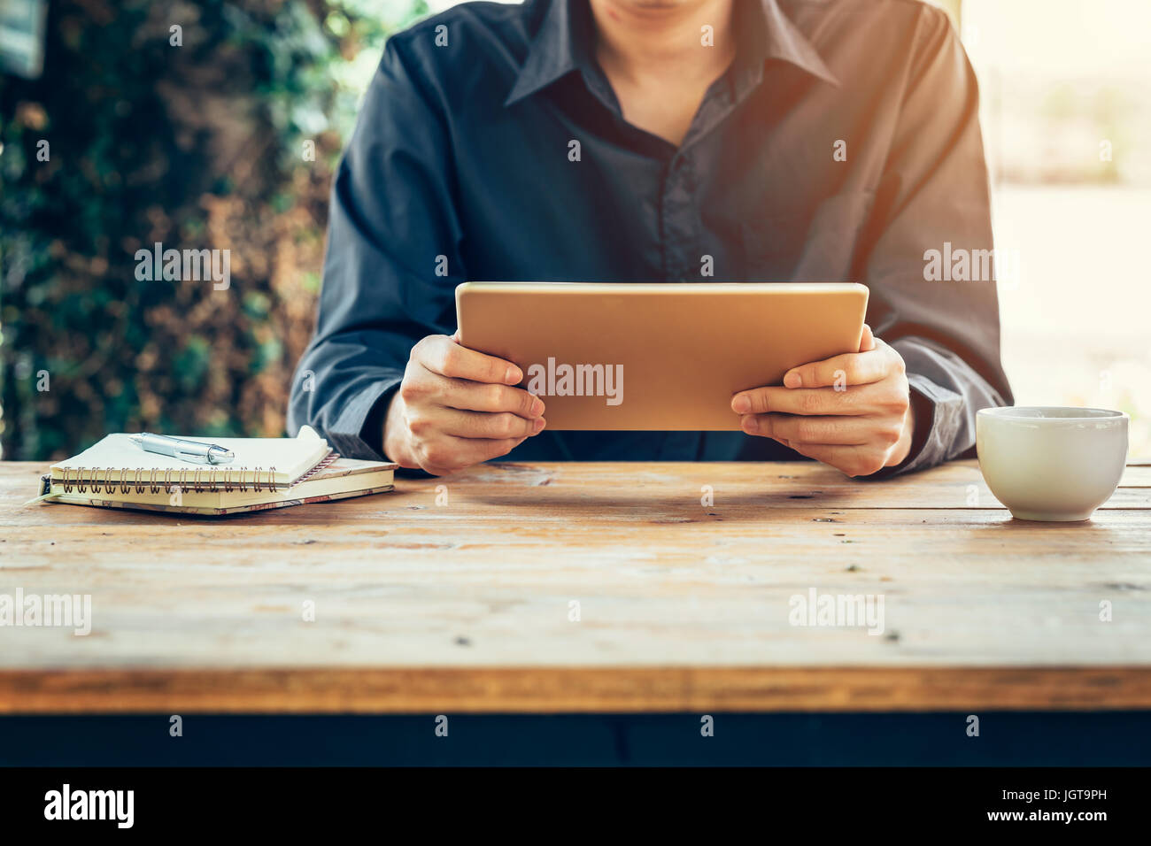 Person on device, asia hi-res stock photography and images - Alamy