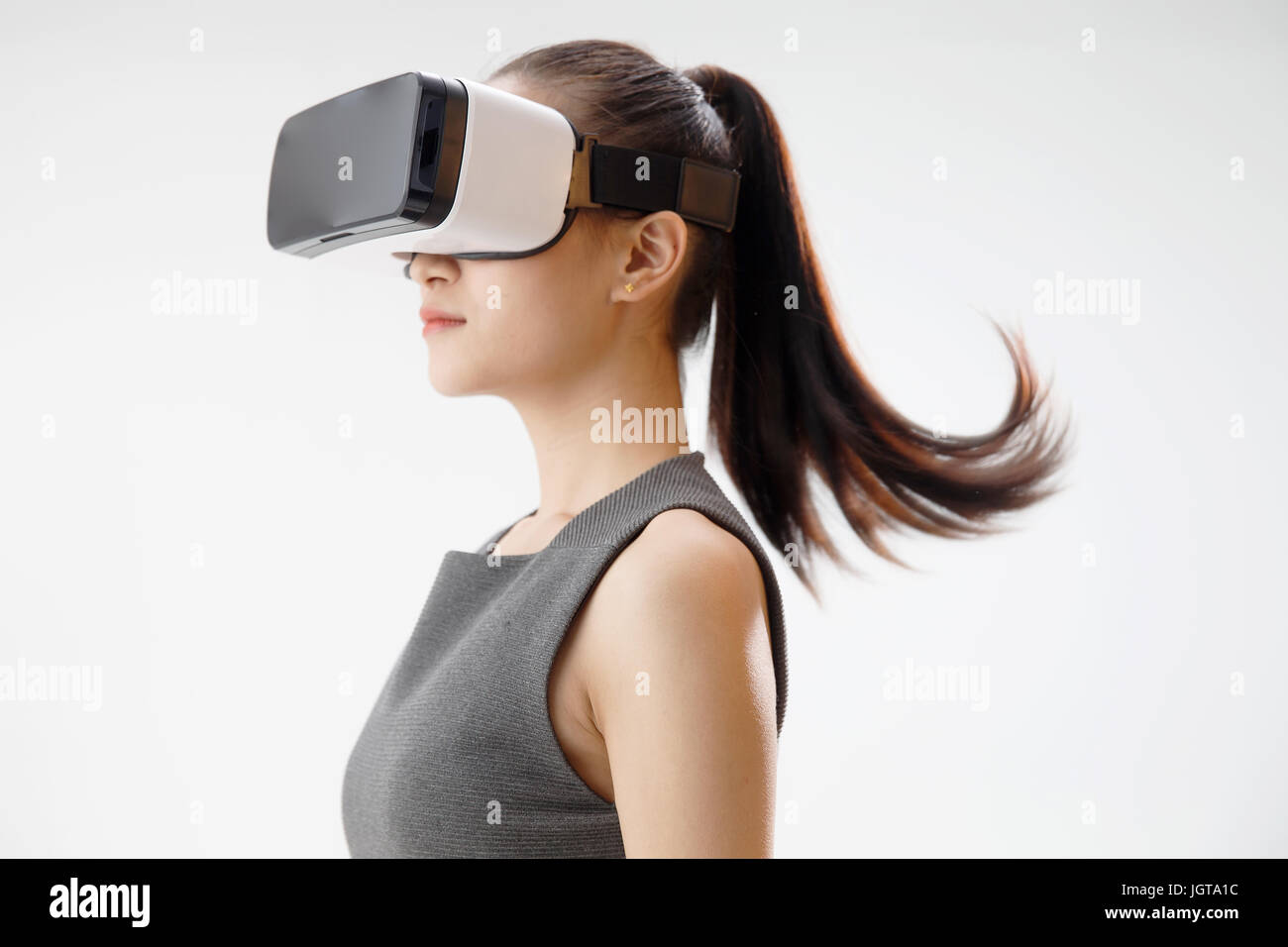 Chinese ethnicity headset hi-res stock photography and images - Alamy