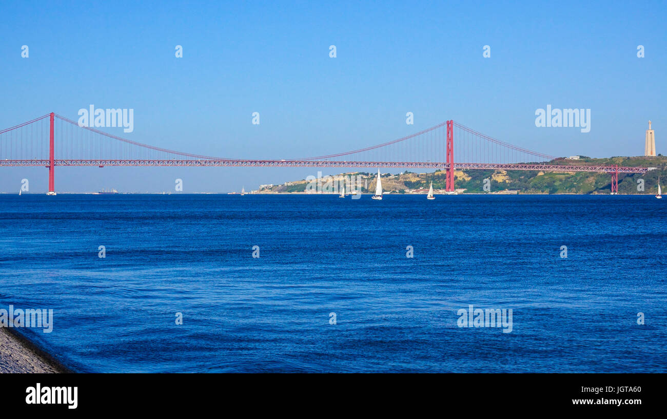 Famous 25th April Bridge over River Tajo in Lisbon aka Salazar Bridge ...