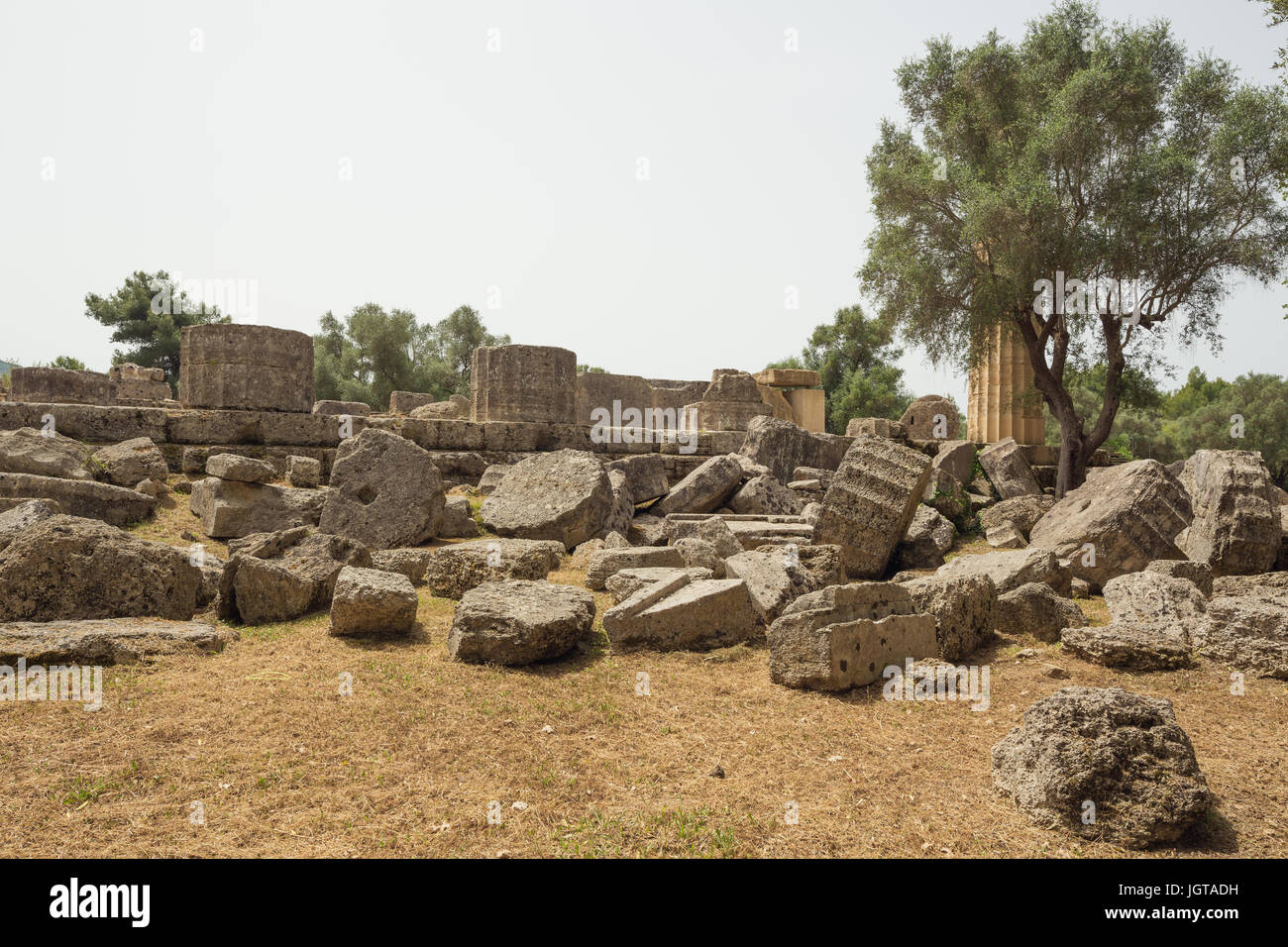 Toppled columns of the Zeus temple in Olympia Stock Photo - Alamy