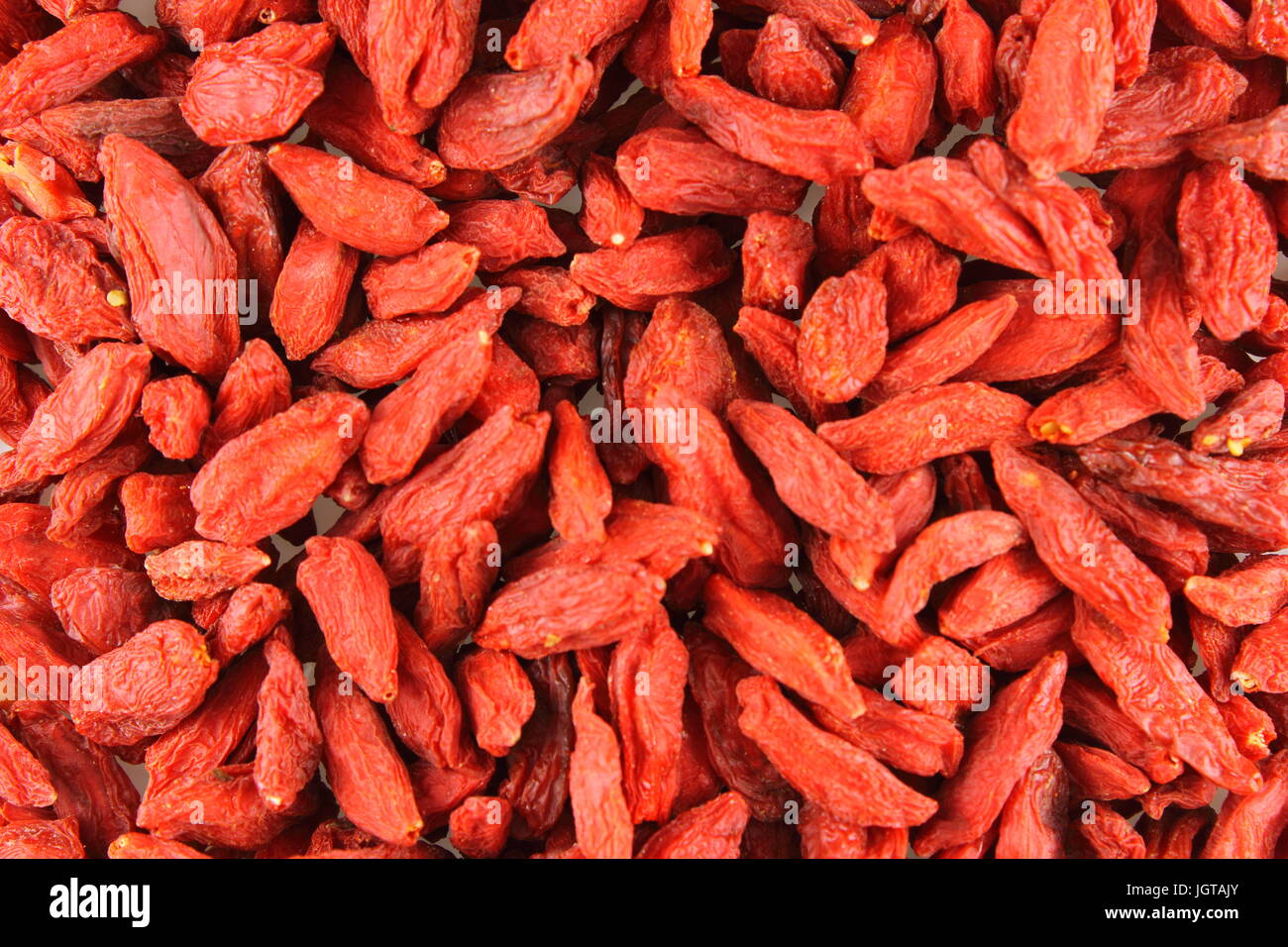 dried goji berries closeup as a food background texture Stock Photo - Alamy