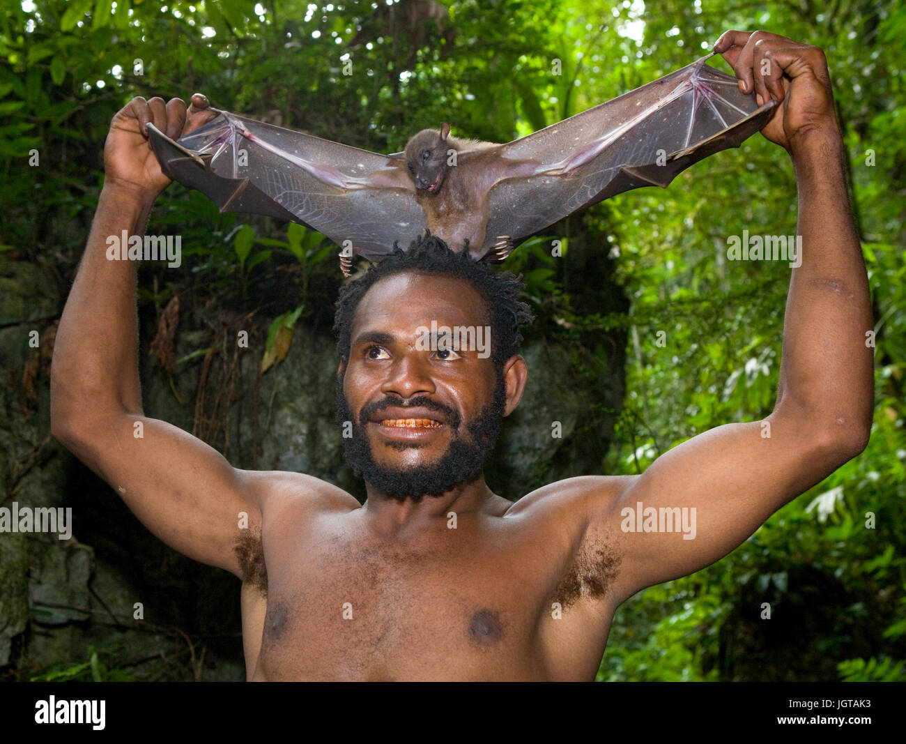 NEW GUINEA, INDONESIA - 13 JANUARY: Portrait of a man of the tribe ...