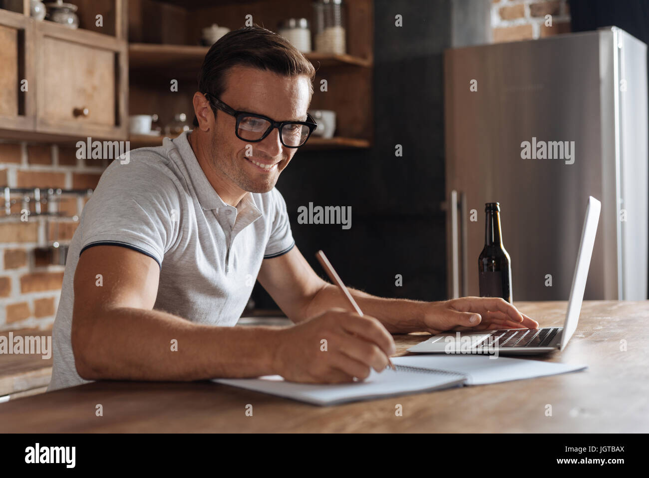 Ambitious creative man writing down his ideas Stock Photo - Alamy