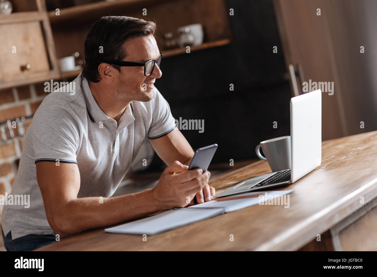 Motivated intelligent man looking at data Stock Photo - Alamy Motivated intelligent man looking at data Stock Photo - Alamy