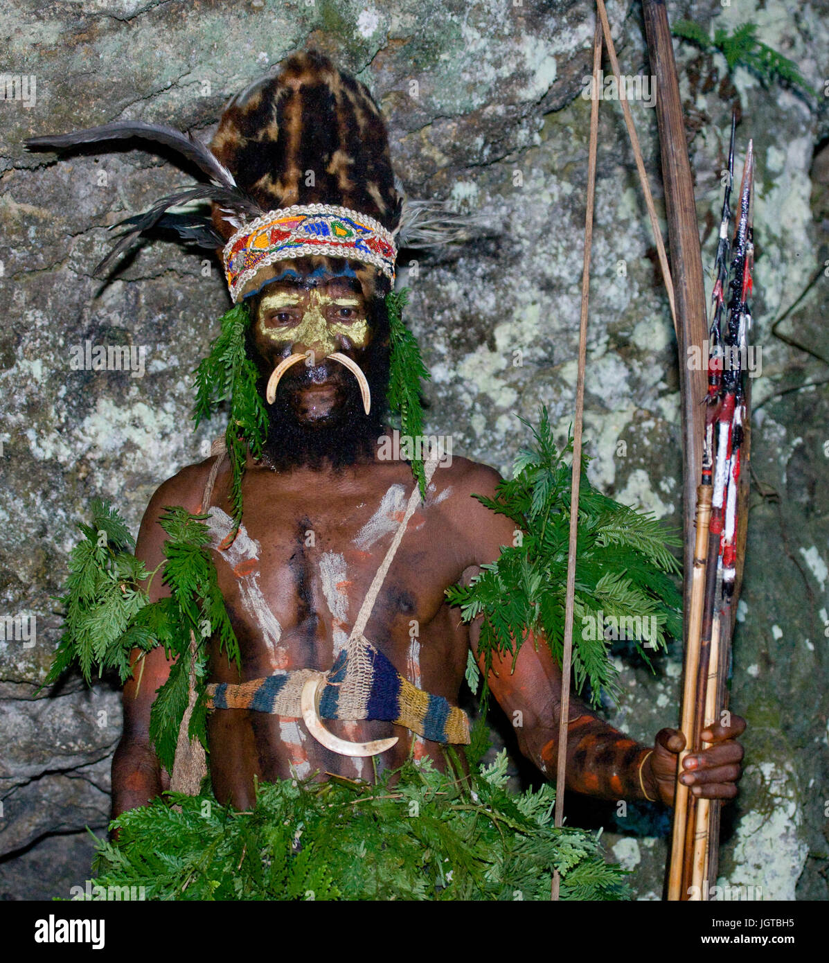 NEW GUINEA, INDONESIA - 13 JANUARY: Warriors tribe Yaffi in war paint ...