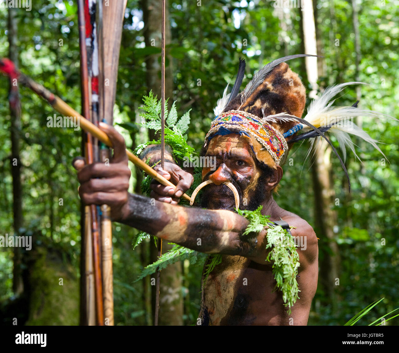 NEW GUINEA, INDONESIA - 13 JANUARY: The warriors of a Papuan tribe of ...