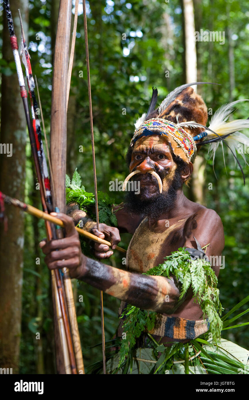 NEW GUINEA, INDONESIA - 13 JANUARY: The warriors of a Papuan tribe of ...