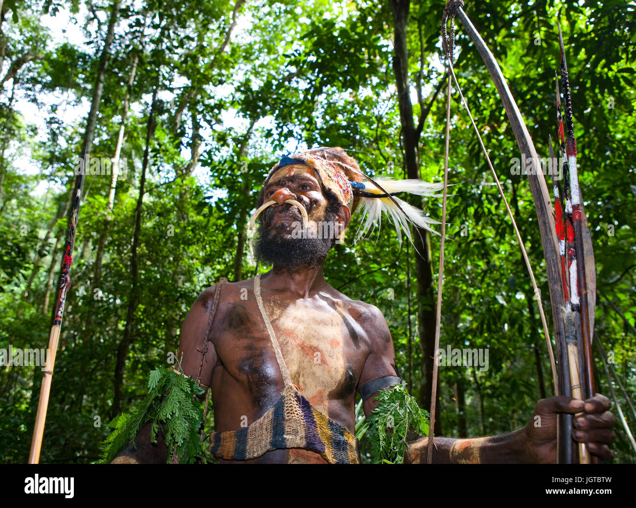 NEW GUINEA, INDONESIA - 13 JANUARY: The warriors of a Papuan tribe of ...