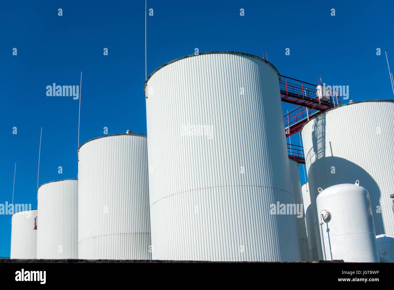 Industrial storage of a liquid materials Stock Photo - Alamy
