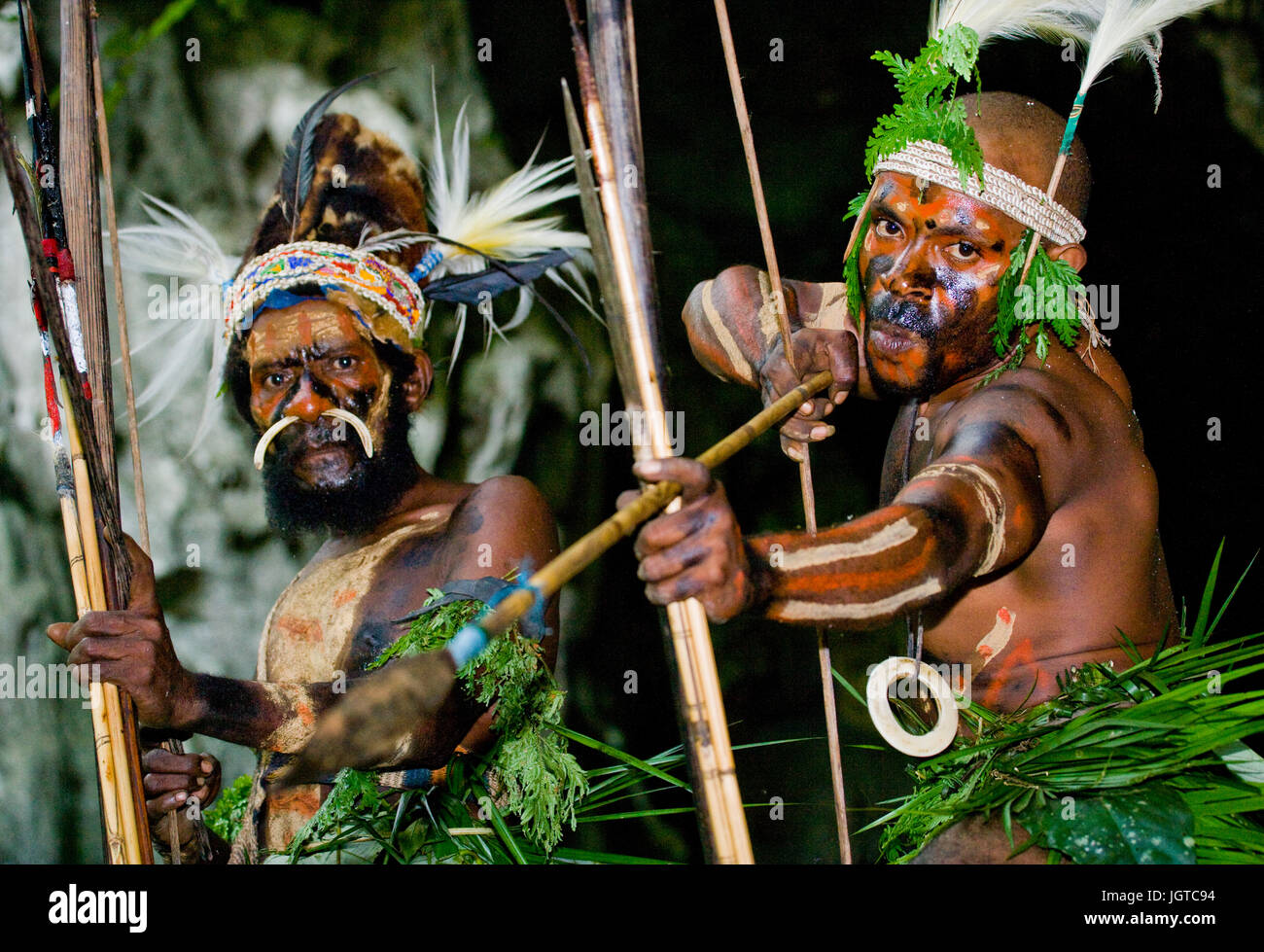 NEW GUINEA, INDONESIA - 13 JANUARY: Warriors tribe Yaffi in war paint ...