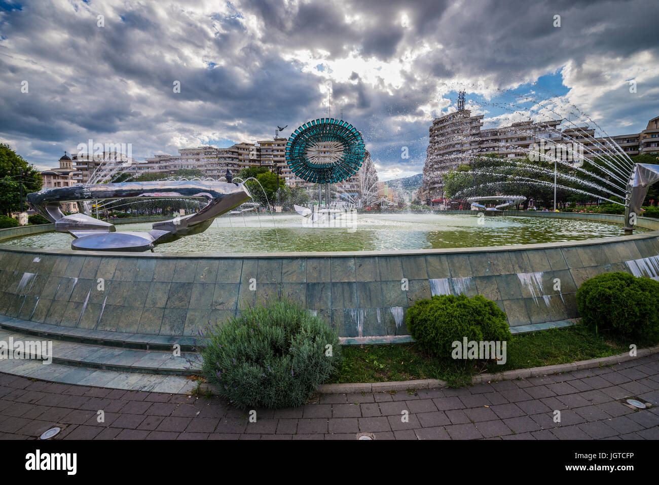 Fountain in Union Park (Parcul Unirii) and apartment blocks in Alba ...