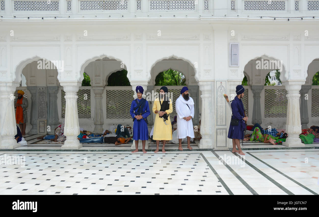 Amritsar, India - Jul 25, 2015. A Sikh family in traditional clothes ...