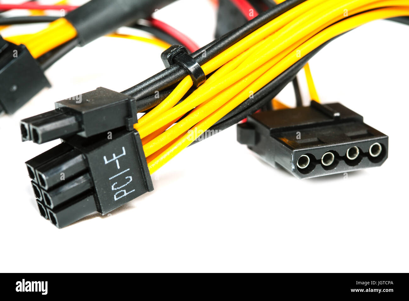 connecting wires to a computer on a white background Stock Photo - Alamy