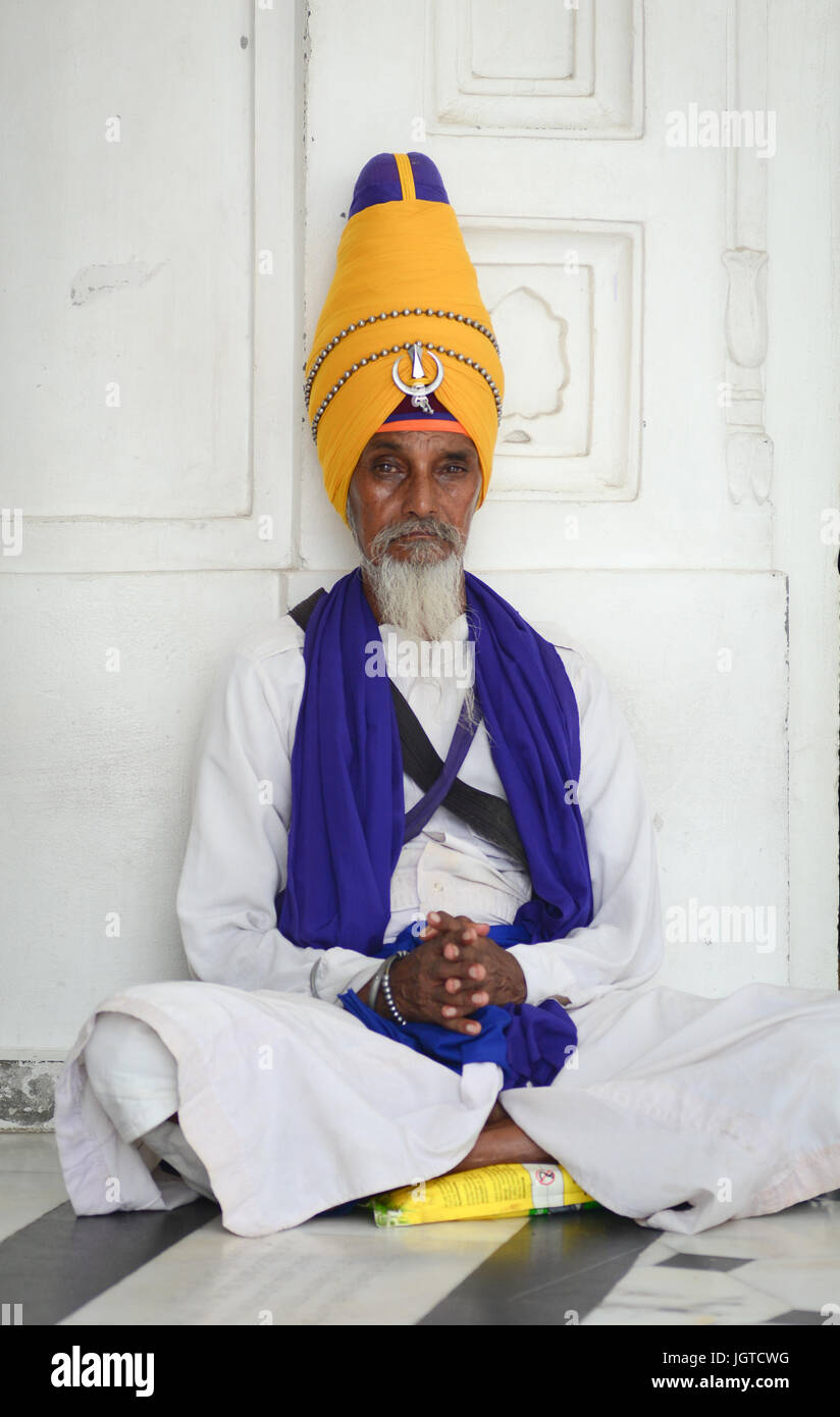 Amritsar, India - Jul 25, 2015. A Sikh man in traditional clothes at ...