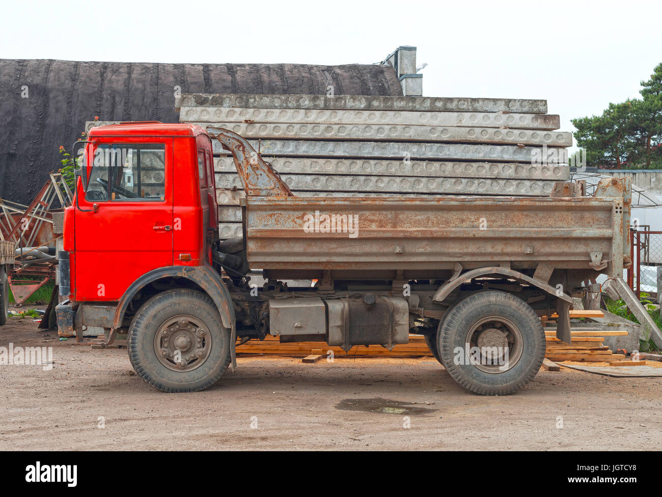 Empty old soviet tipper truck on construction site Stock Photo - Alamy