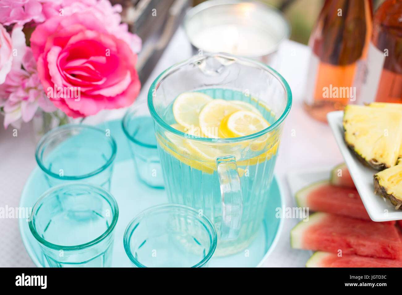 Lemonade and pink wine of summer lunch table Stock Photo - Alamy