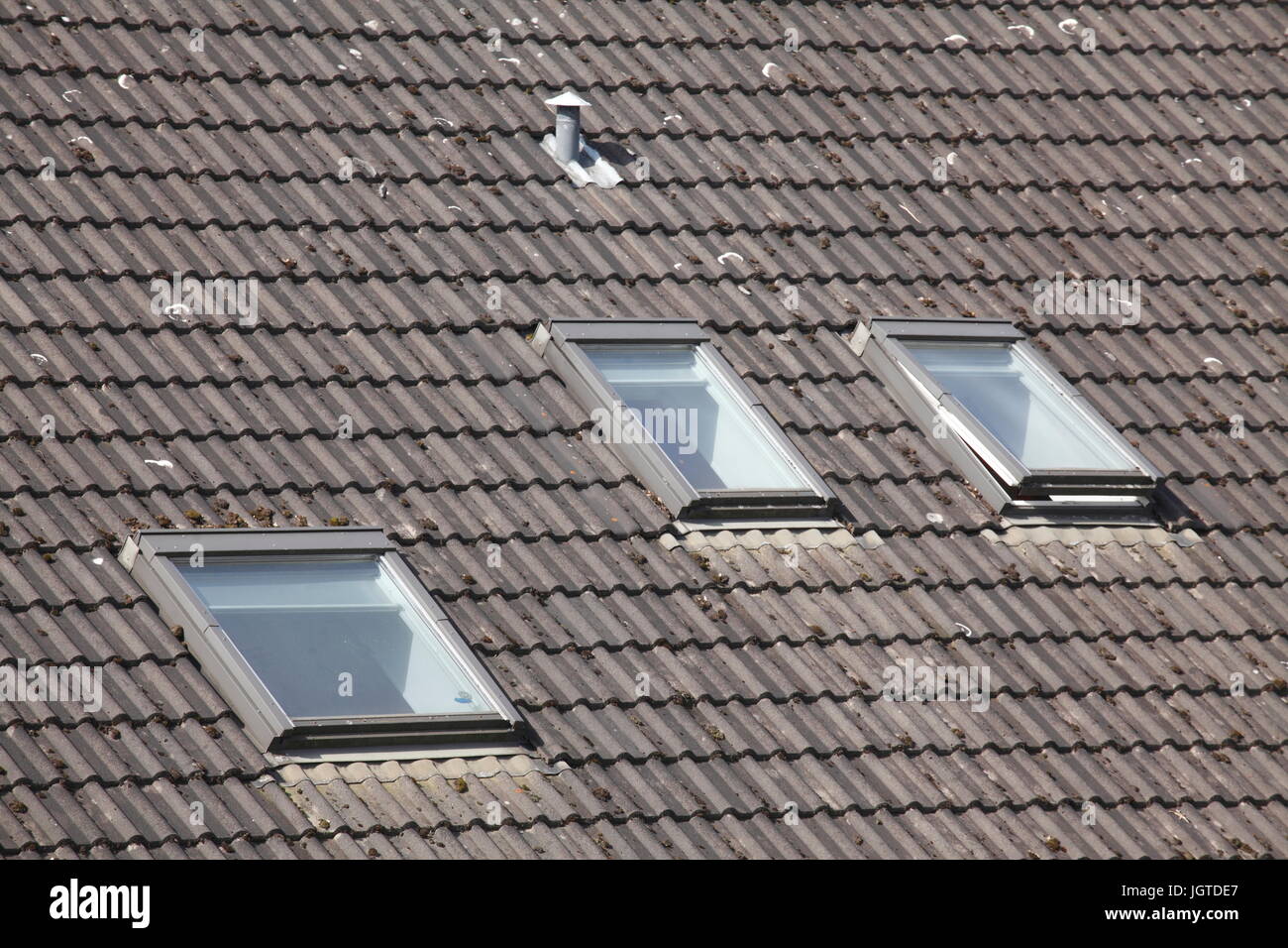 House roof with roof Windows Stock Photo - Alamy