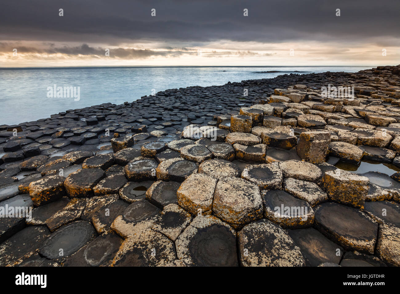 The hexagonal basalt formations of Giant's Causeway in Northern Ireland ...