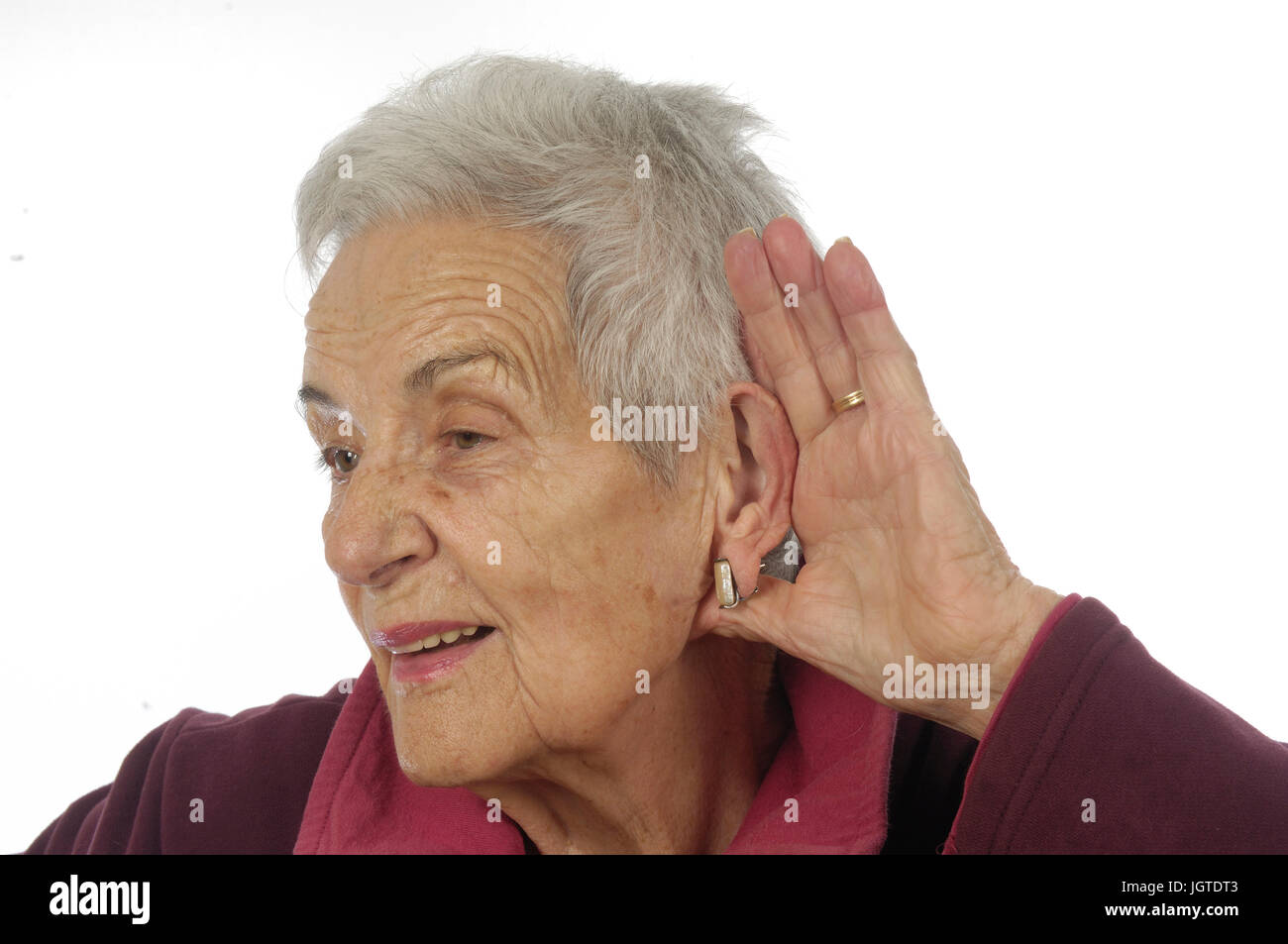 old woman with difficulty hearing Stock Photo - Alamy