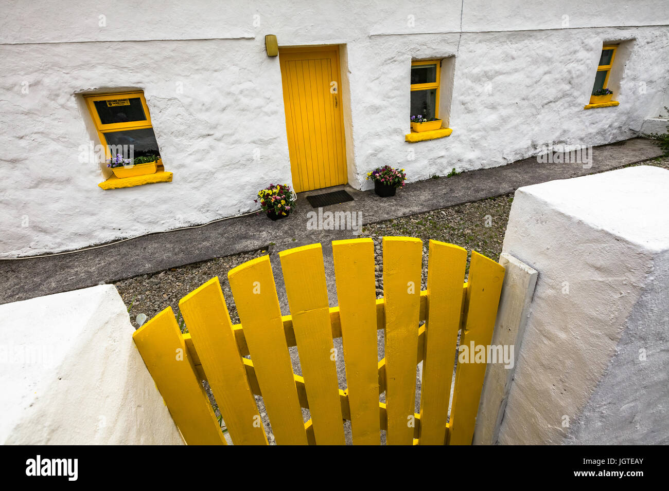 Colorfully painted door and gate on Inisheer, one of the Aran Islands ...