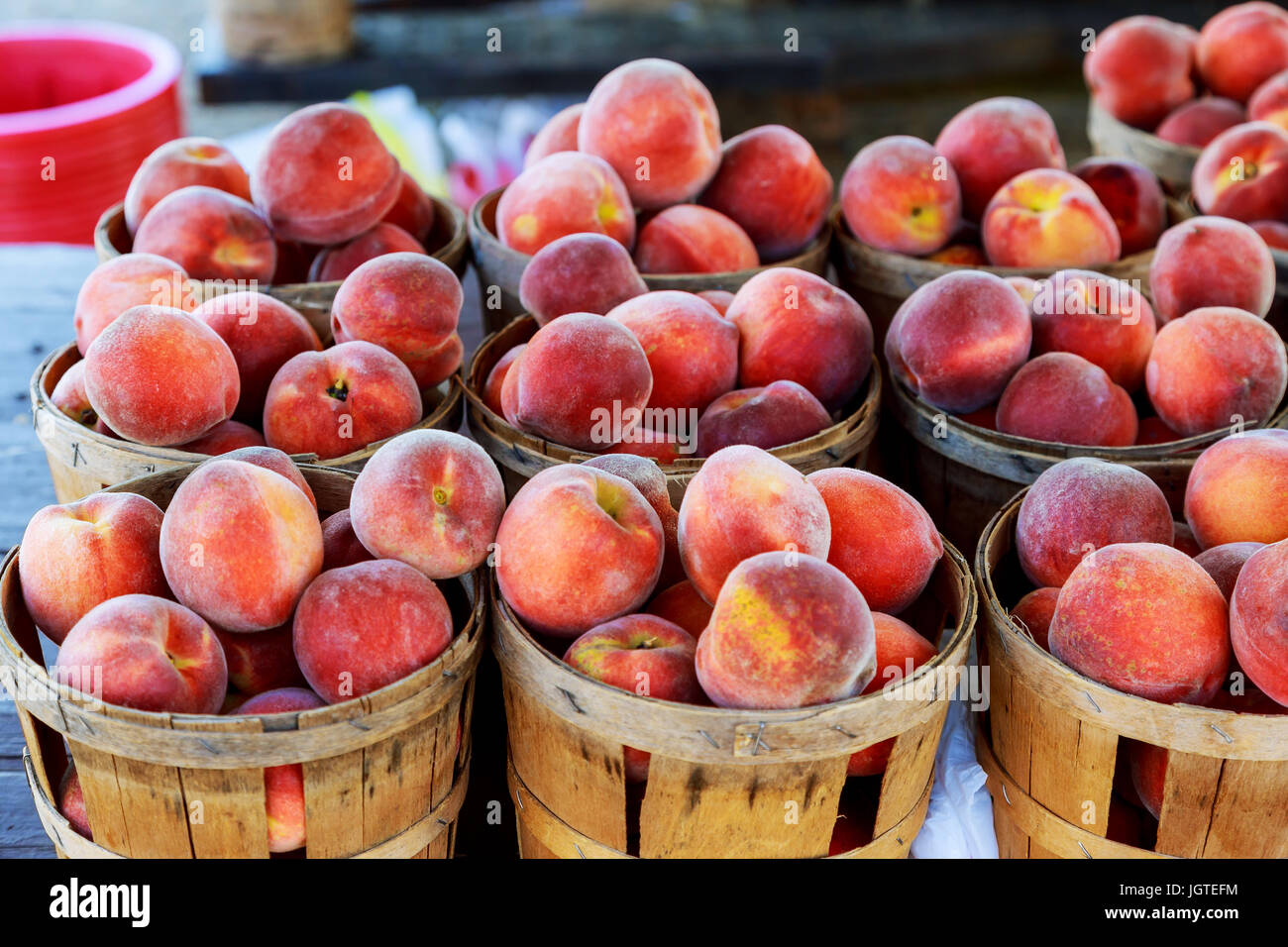 Peaches on a weekly street market stall Selling peaches on the market ...